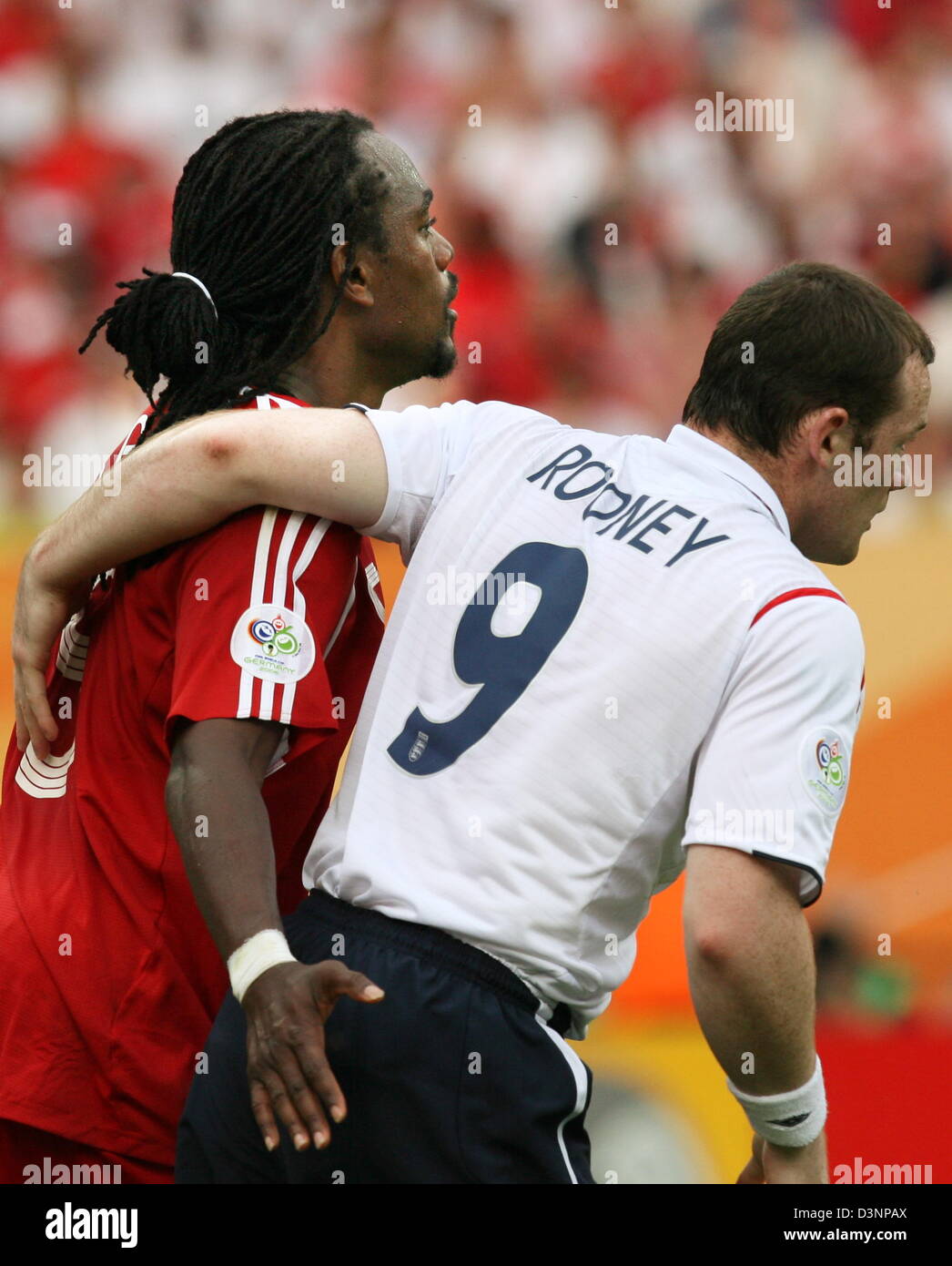 Wayne Rooney of England (R) and Brent Sancho of Trinidad during the ...
