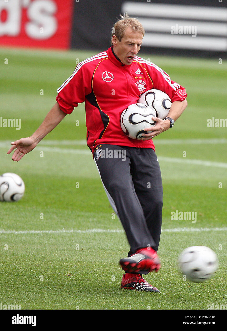 German national coach Juergen Klinsmann shows his skills during the ...