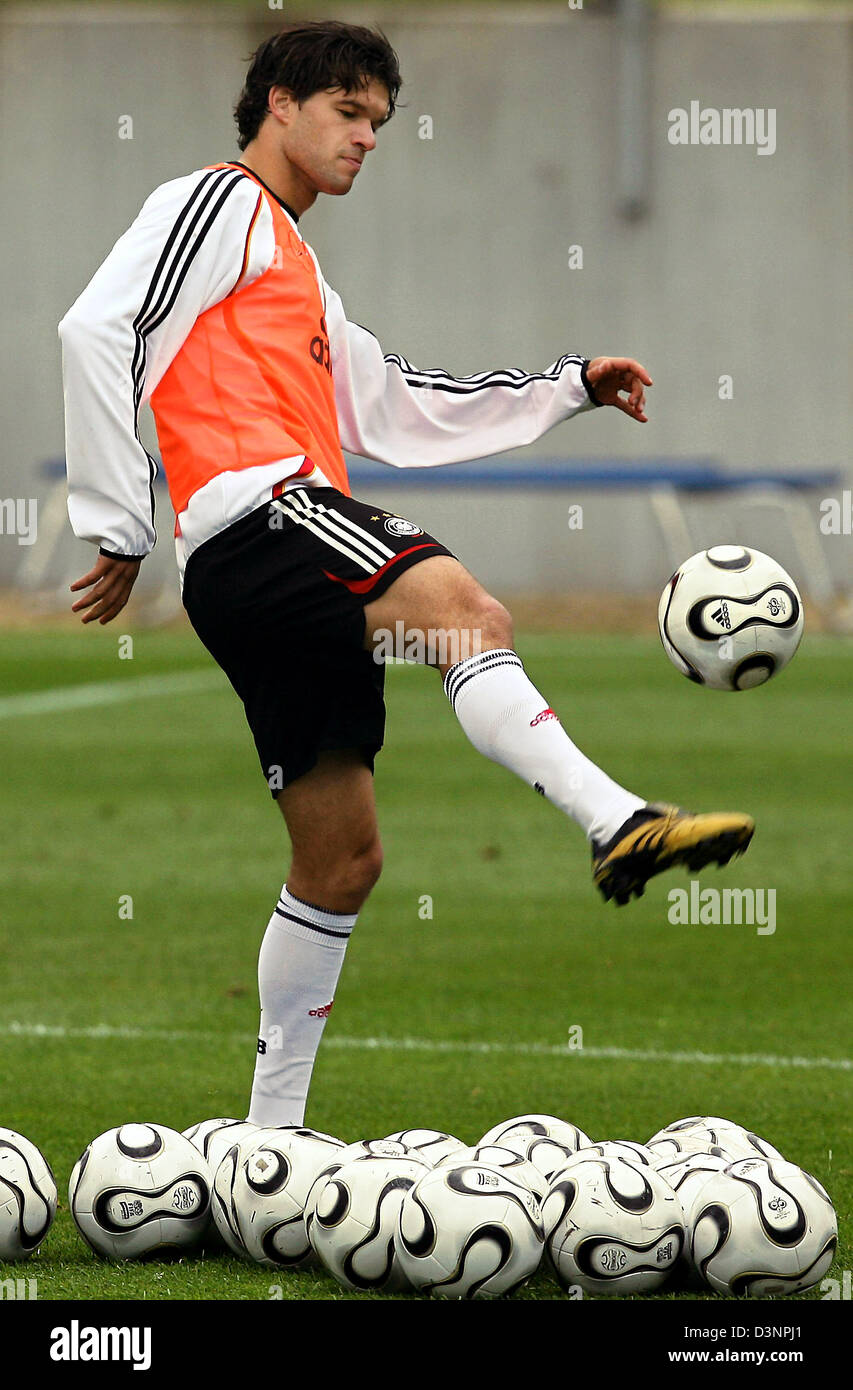 German international Michael Ballack kicks a ball during the training ...
