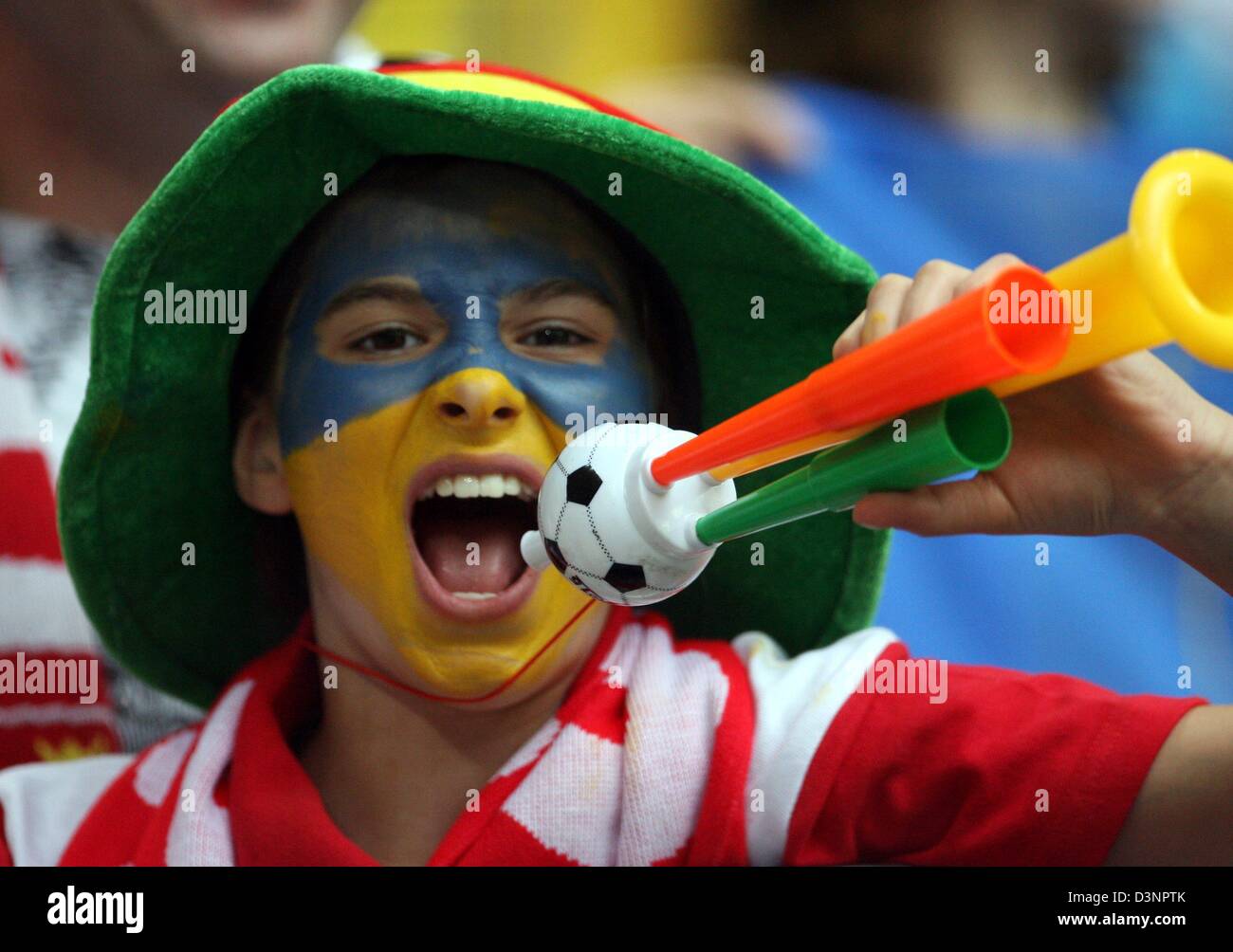 A Supporter of the team from the Ukraine cheers prior to the group H ...