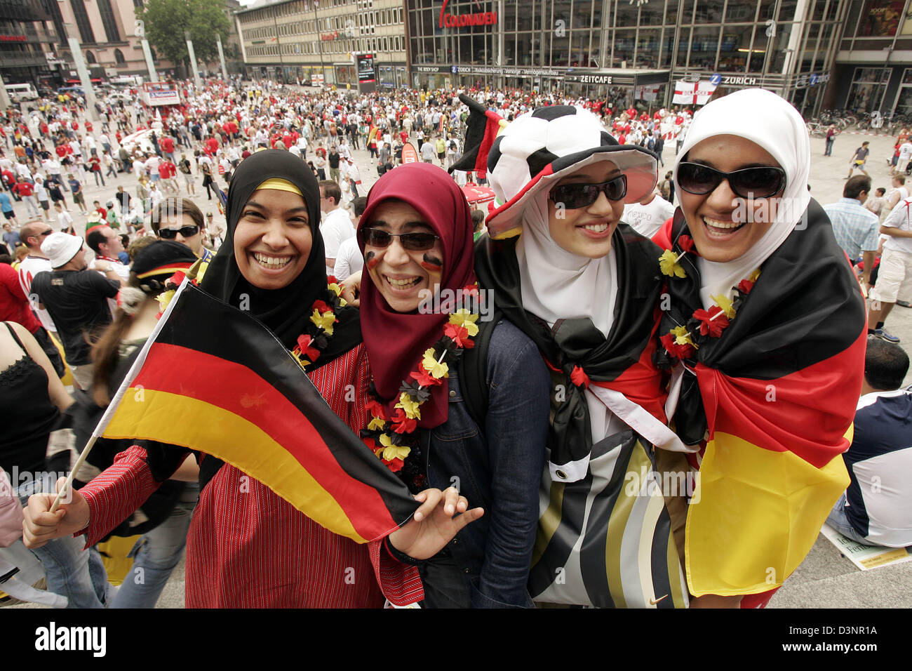 German muslim soccer fans celebrate in front of the central train ...
