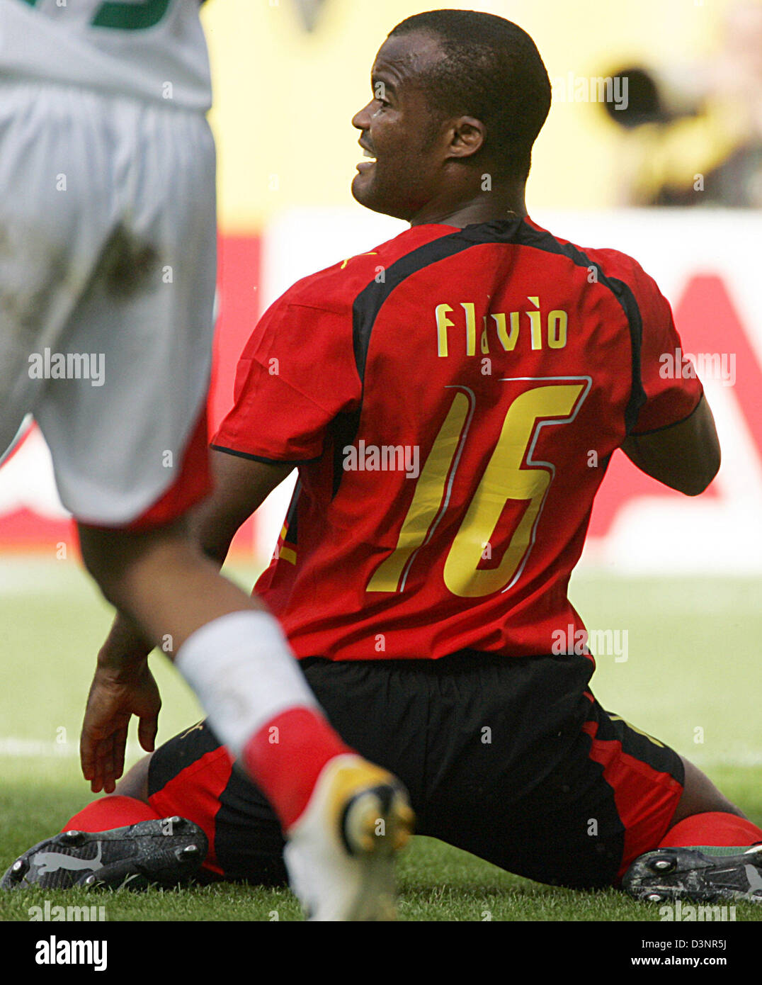 Angolan player Flavio celebrates after scoring the 1-0 lead during ...