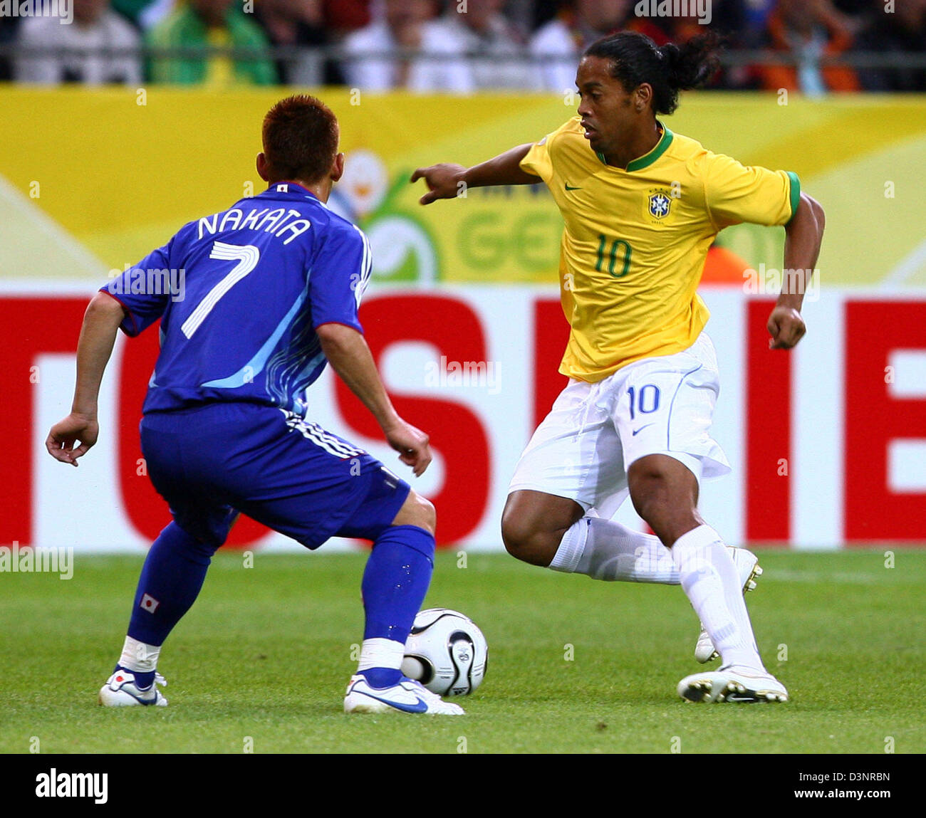 Hidetoshi Nakata (L) from Japan and Ronaldinho (R) from Brazil fight ...