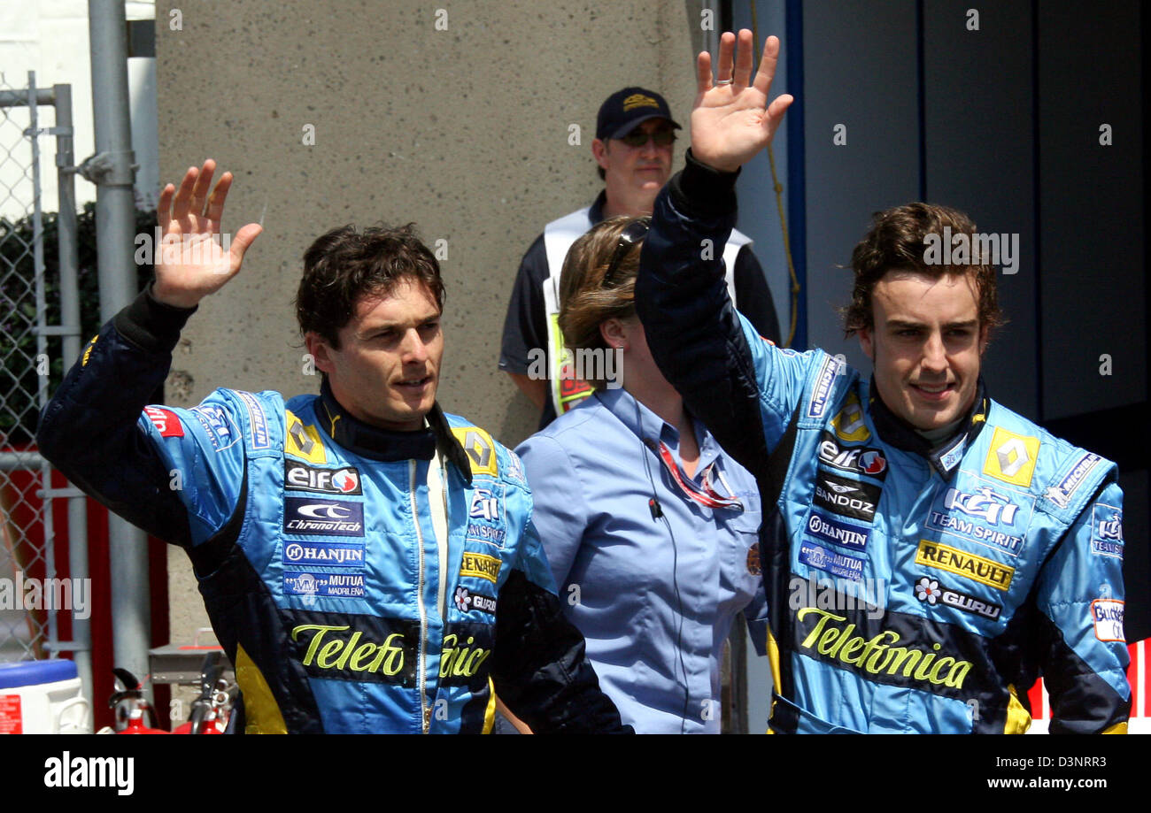 Spanish Formula One pilot Fernando Alonso (R) and Italian Giancarlo ...