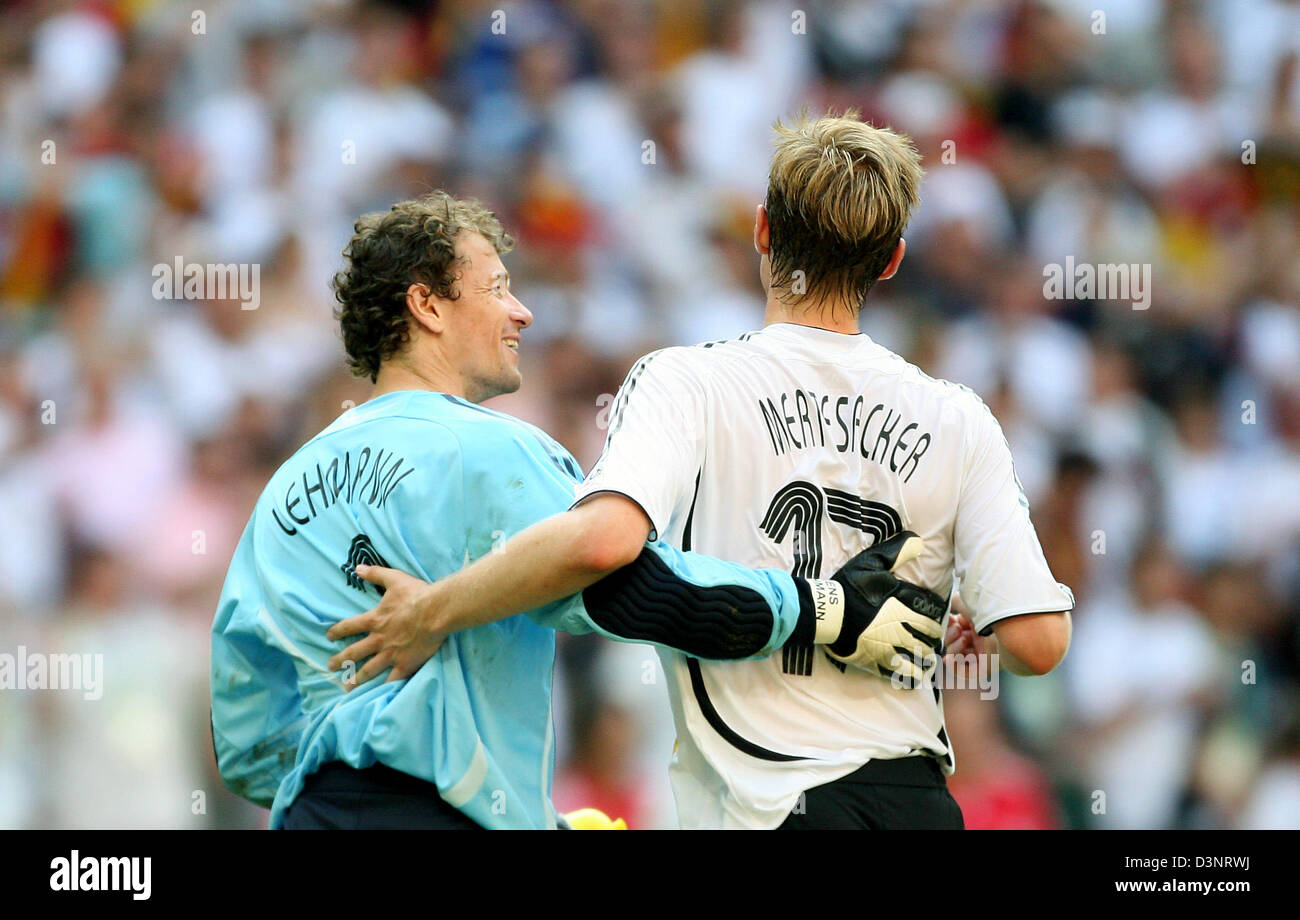 German goalkeeper Jens Lehmann (L) and player Per Mertesacker celebrate ...