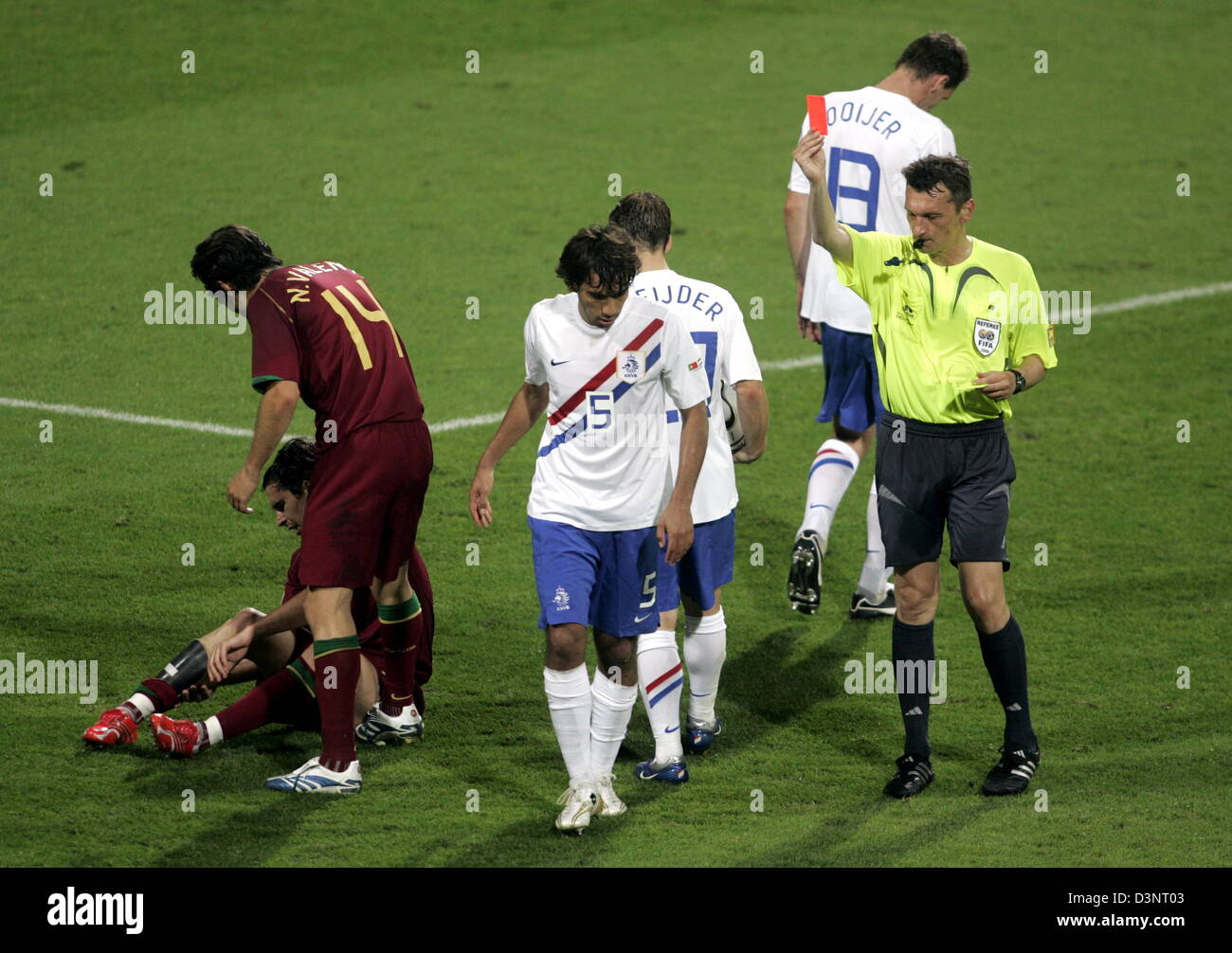 Russian referee Valentin Ivanov (R) sents off Dutch national soccer ...