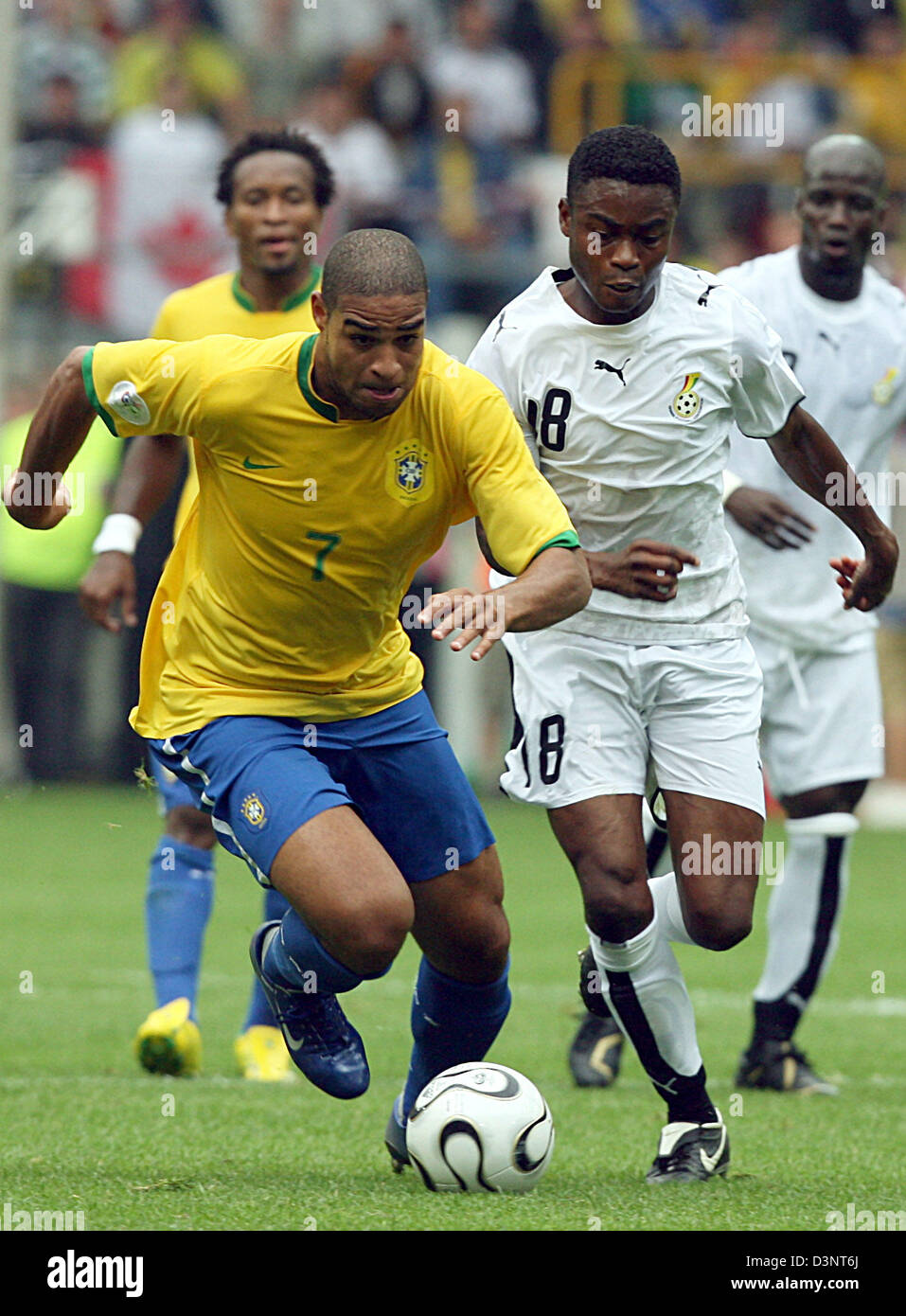 Adriano (L) from Brazil vies with Eric Addo (R) from Ghana during the ...