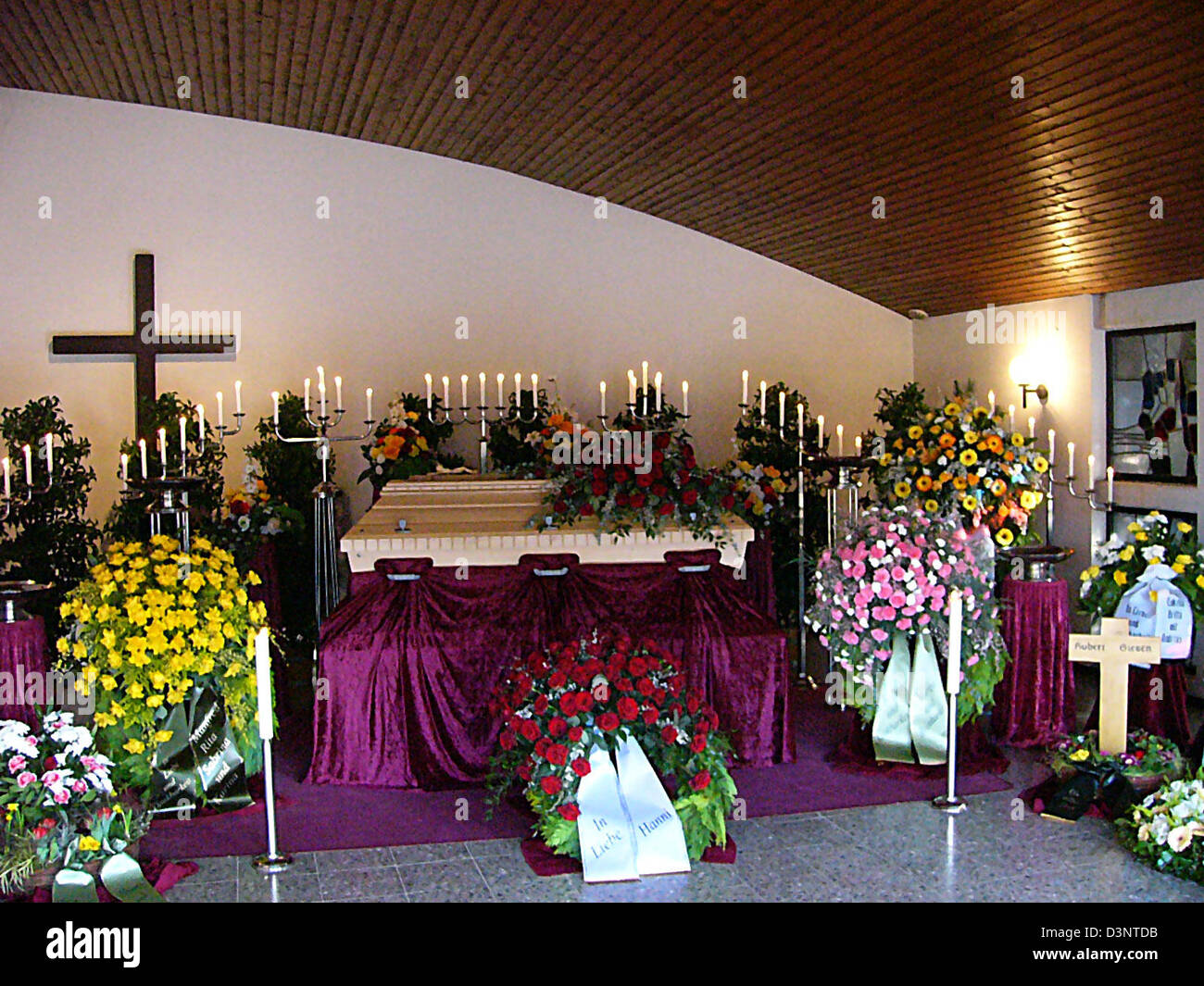 The undated picture shows the coffin a a deceased in a graveyard's ...