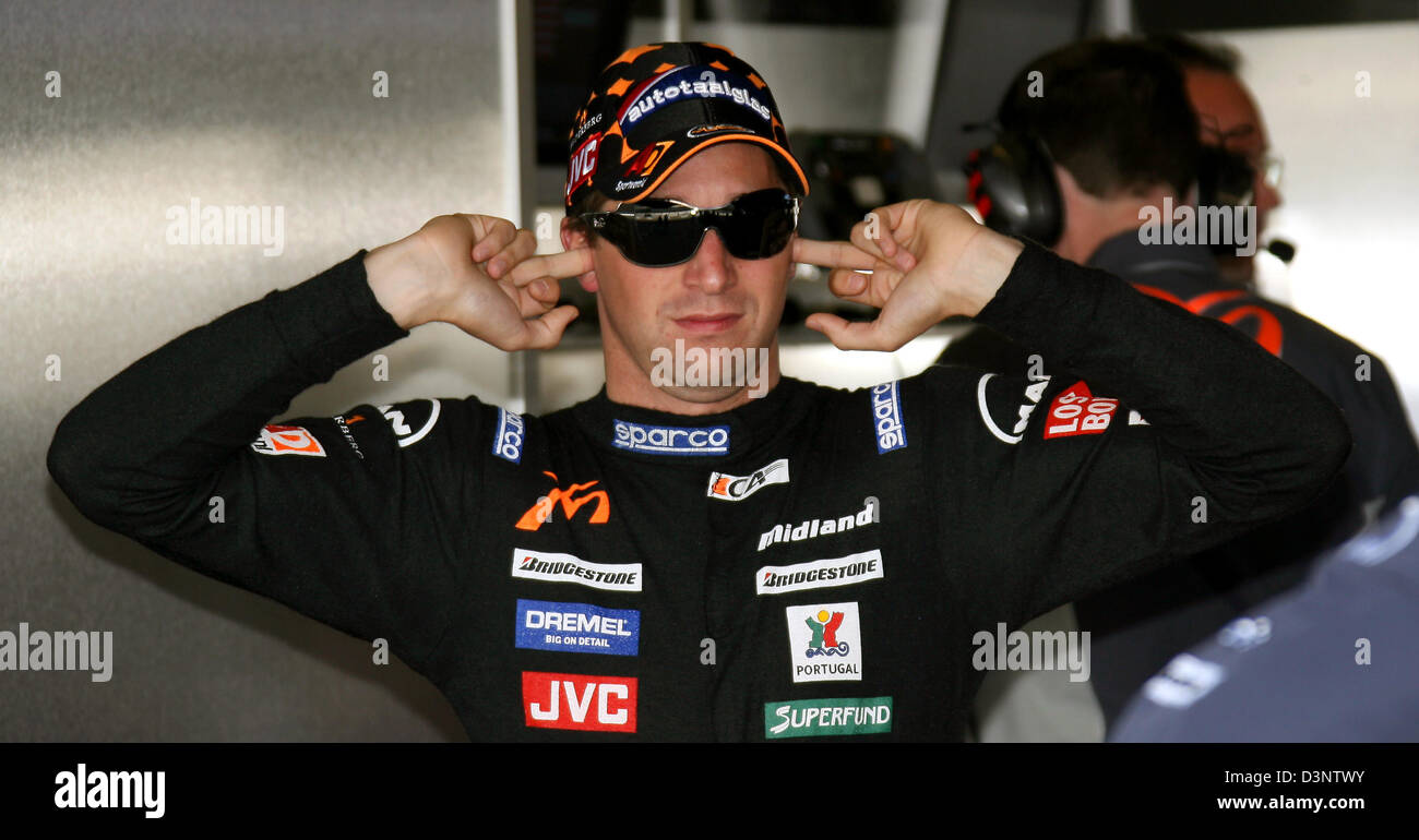 Dutch Formula One pilot Christijan Albers of MF1 Racing team protects ...