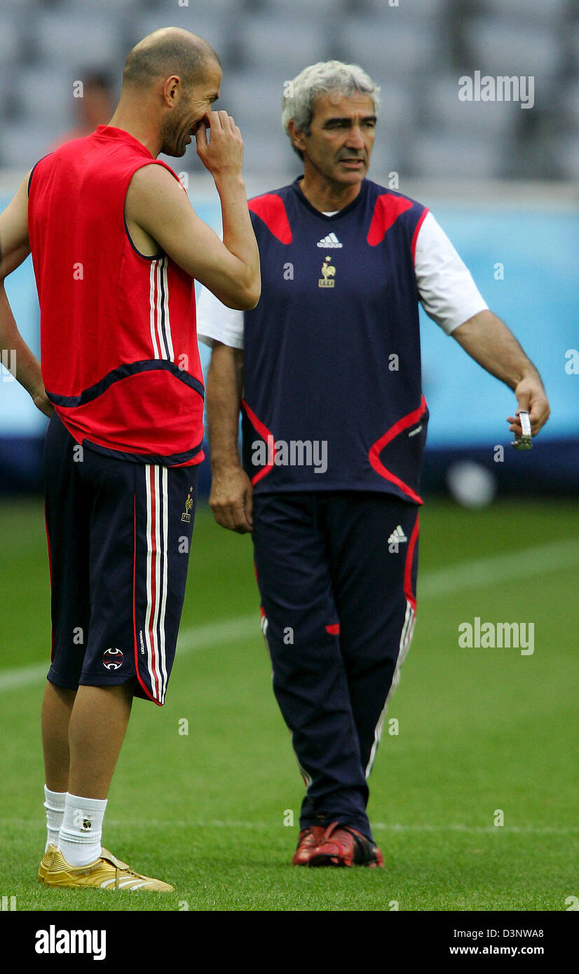 French soccer player Zinedine Zidane (L) talks with his coach Raymond ...