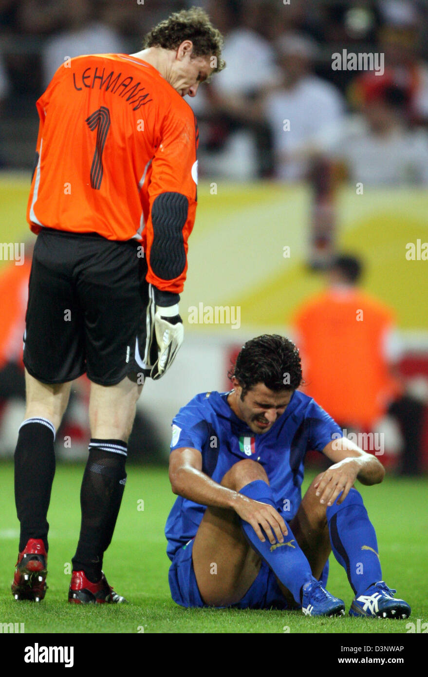 German keeper Jens Lehmann looks after Fabio Grosso from Italy during ...