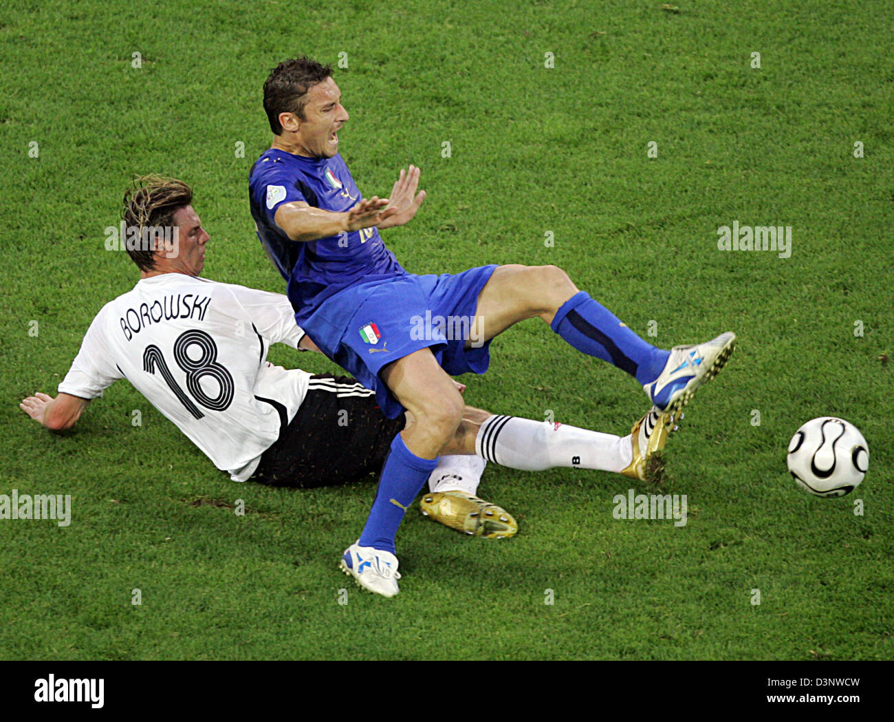 Tim Borowski (L) from Germany vies with Francesco Totti from Italy ...