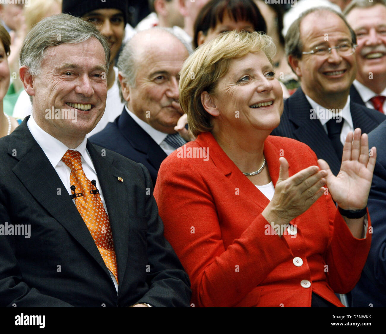 German Chancellor Angela Merkel and President Horst Koehler smile ...