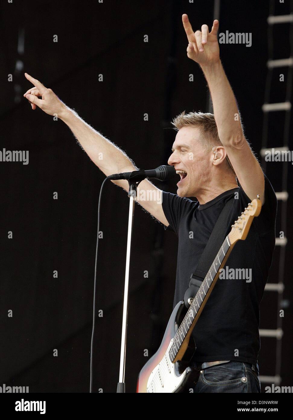 Canadian musician Bryan Adams poses during his performance on the stage ...