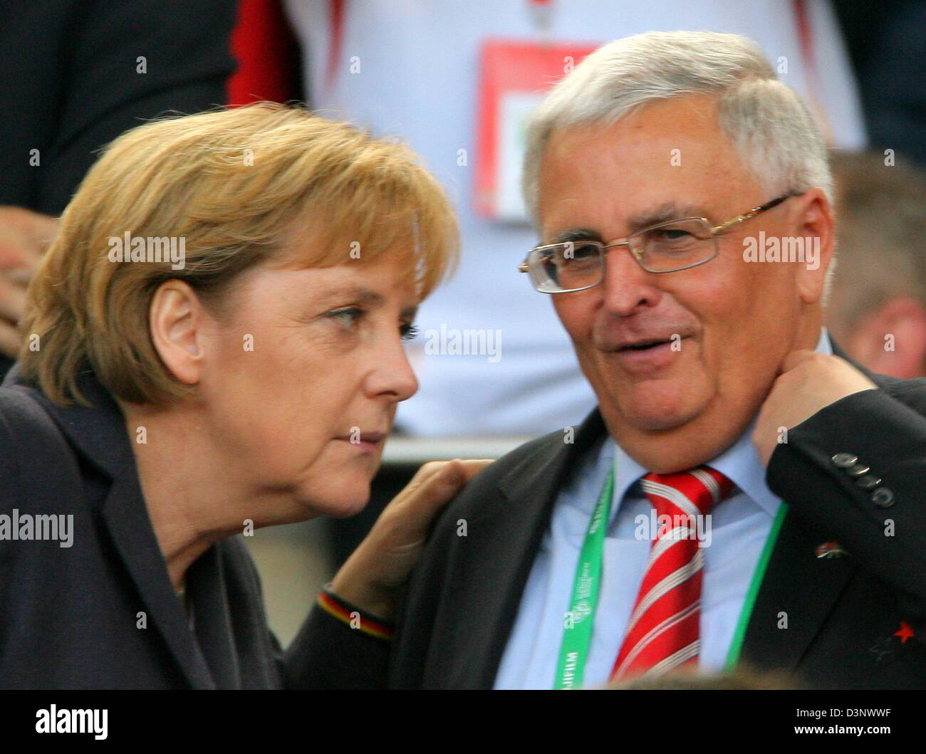 German Chancellor Angela Merkel (L) and Theo Zwanziger, President of ...