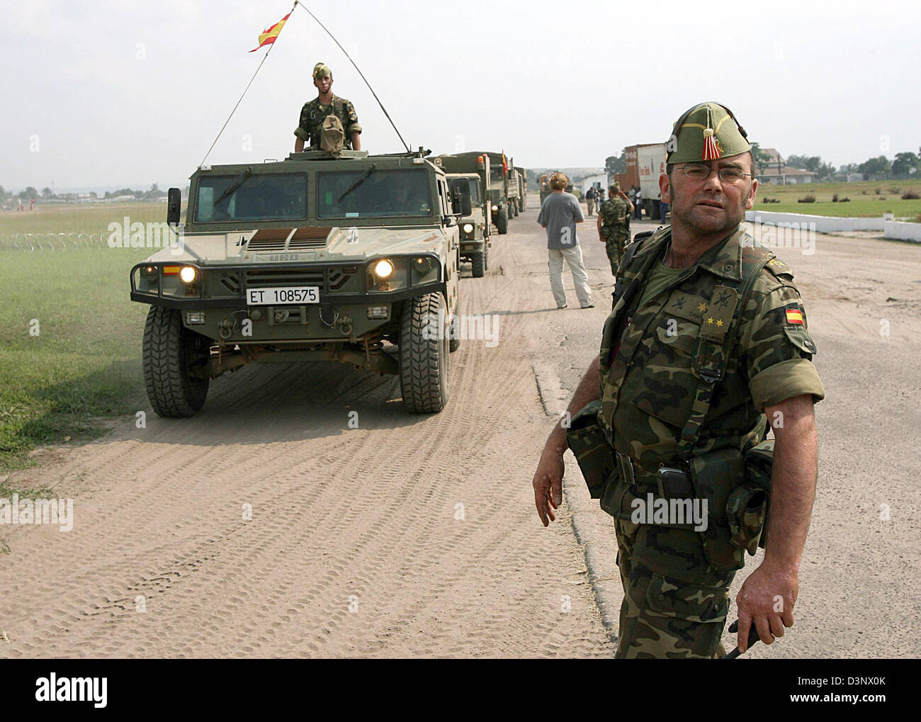 A Spanish military convoy arrives at the EU camp in Kinshasa, Congo ...