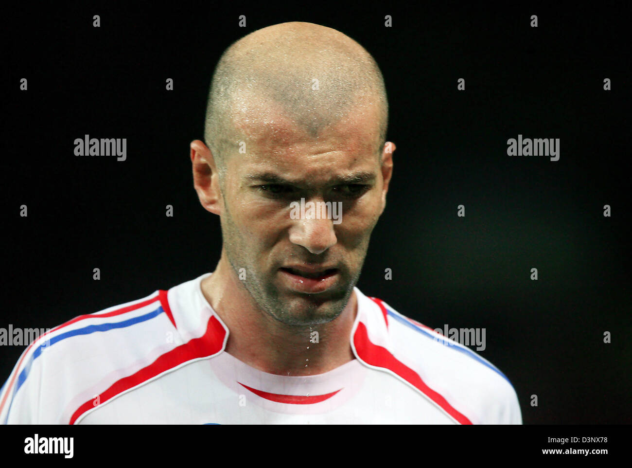 France team captain Zinedine Zidane leaves the pitch after being red ...