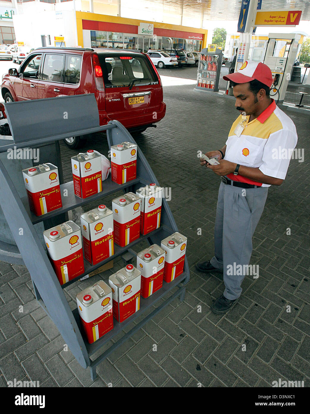 Filling station attendant hi-res stock photography and images - Alamy