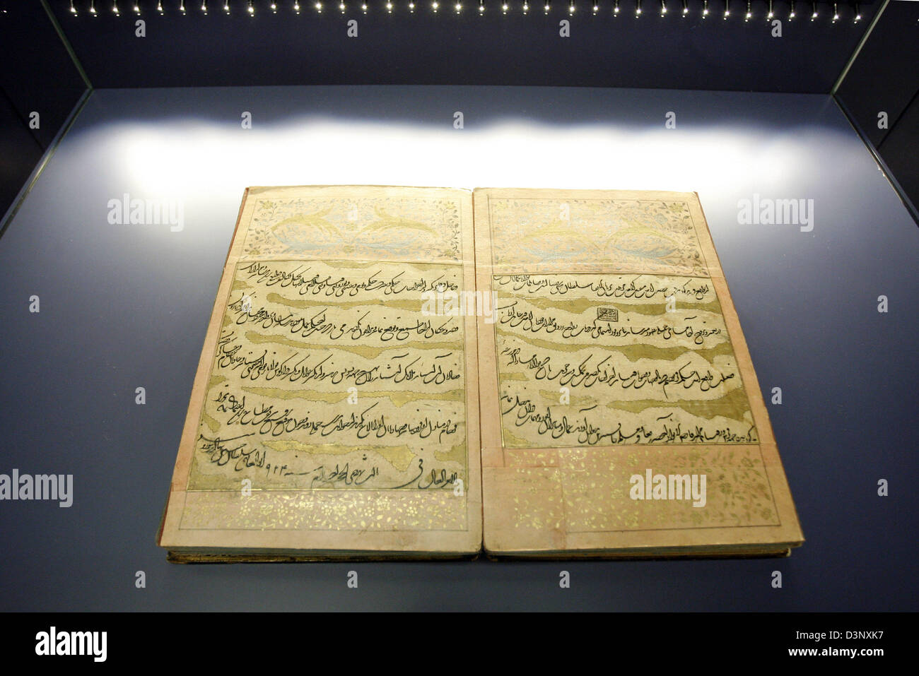 The picture shows pages of the Koran, old parchment with Islamic ...