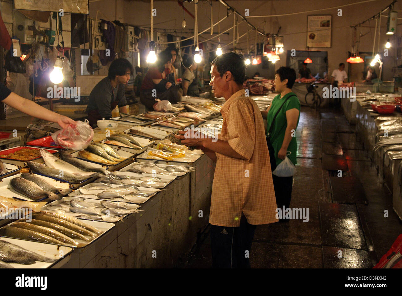 Customers photographed at the fish market located in the Old Town of ...