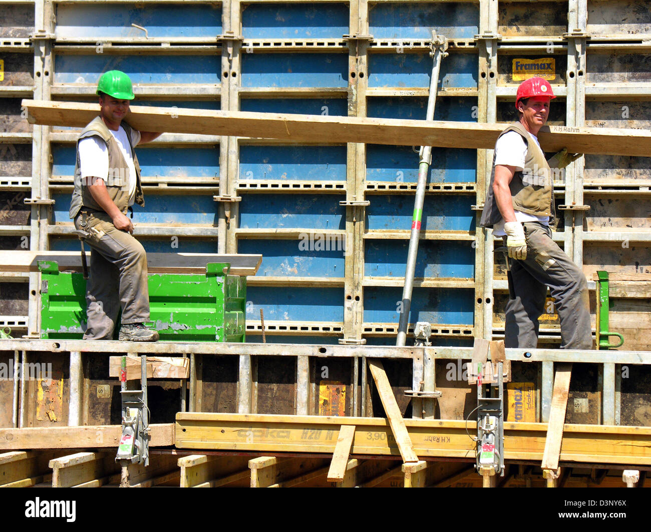 The photo shows construction workers on a construction site in ...