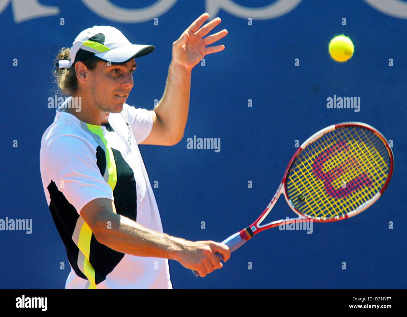 Argentinian tennis pro Gaston Gaudio returns a ball during his match ...