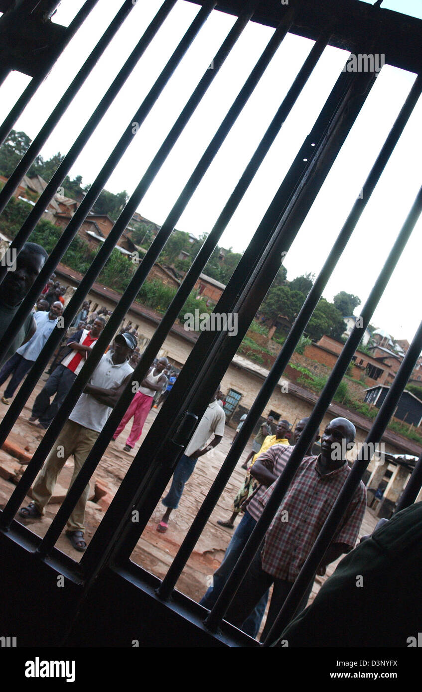 Prisoners photographed through bars at the heavily guarded military ...