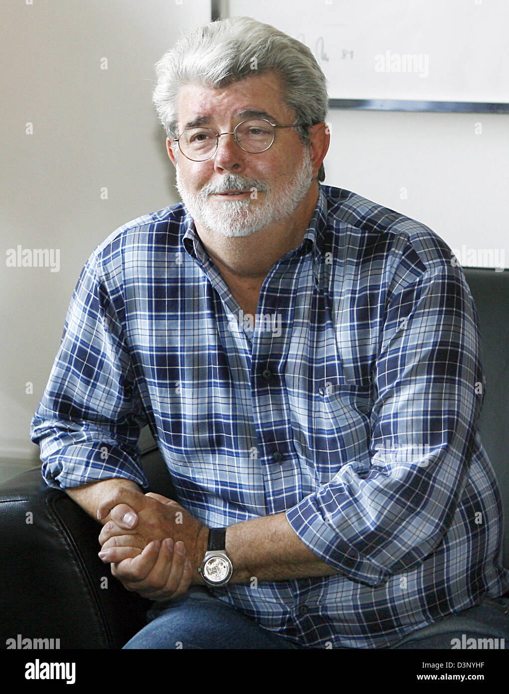 US director George Lucas sits in the office of the mayor in the Red ...