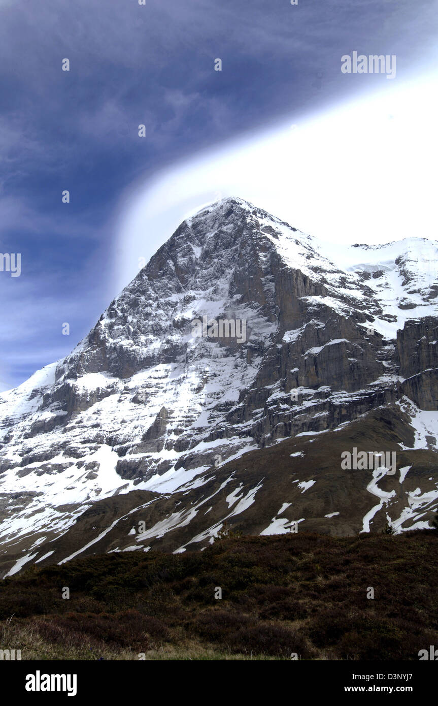 The picture shows the north wall of Eiger Mountain covered with snow in ...
