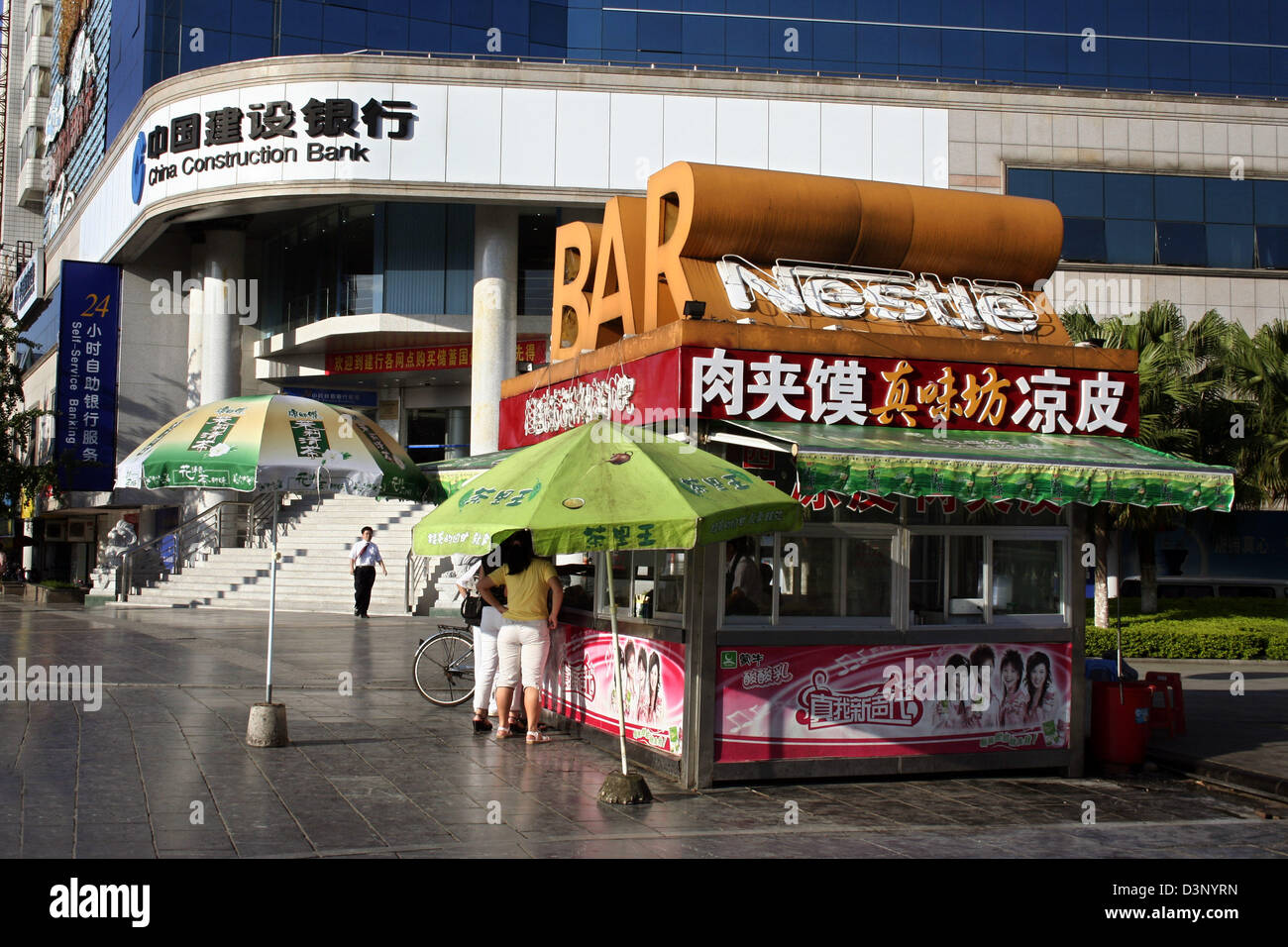 A Nestle Coffe Bar picture in front of a branch of the China ...