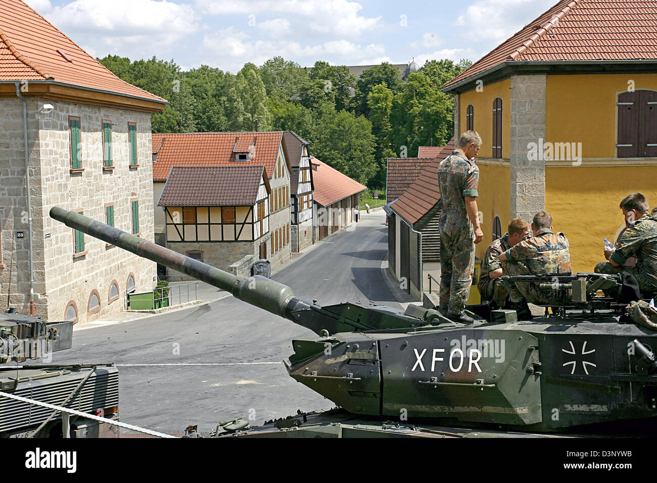 Soldiers of the German Bundeswehr manoeuvre with tanks in the training ...