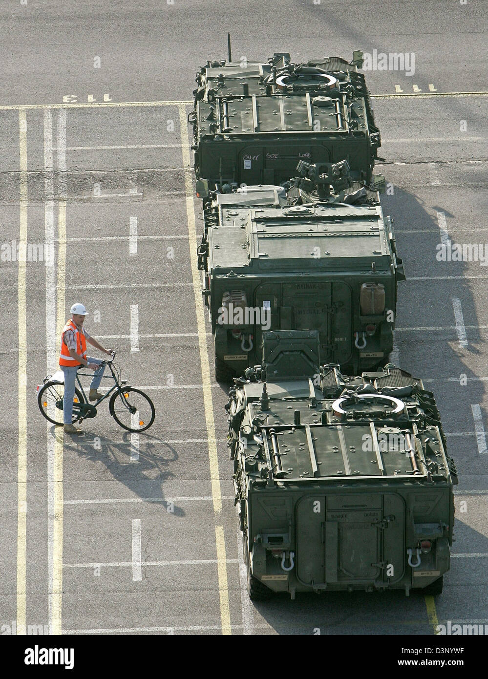 Soldiers of the US Army park the first of 120 STRYKER unloaded off the ...