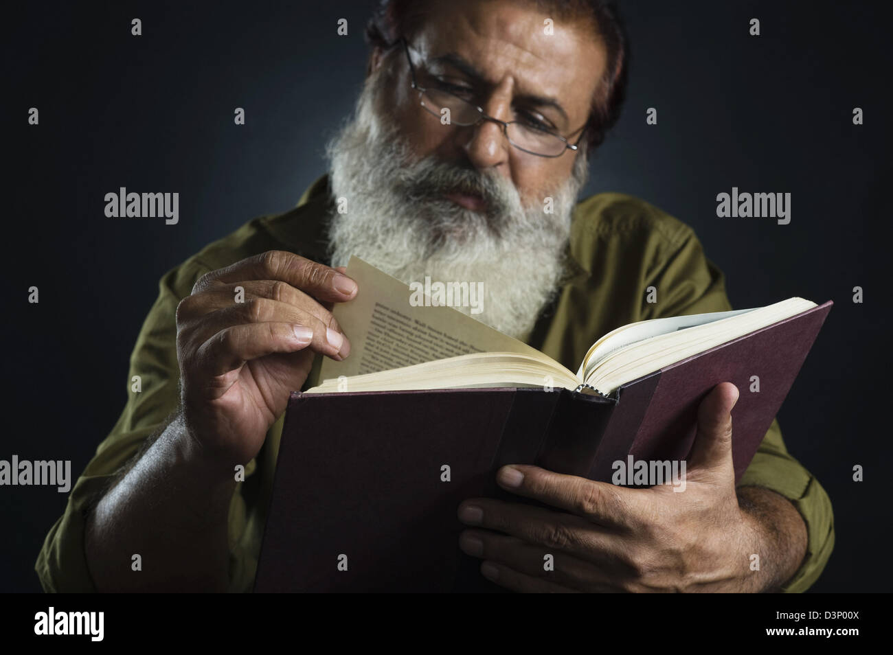 Man reading a book Stock Photo - Alamy