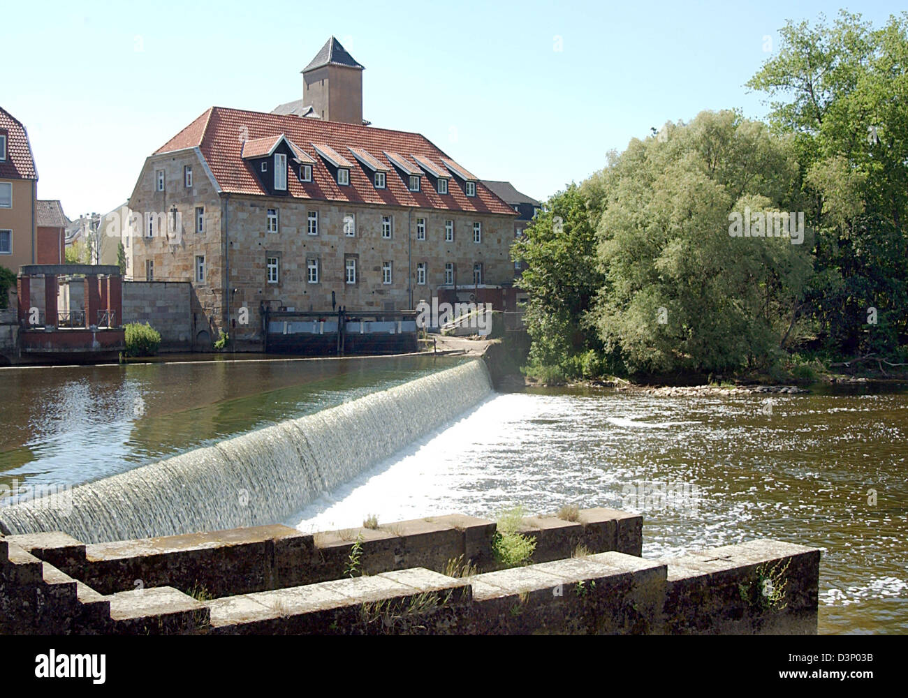 The picture shows the Ems dam and the old mill in Rheine, Germany ...