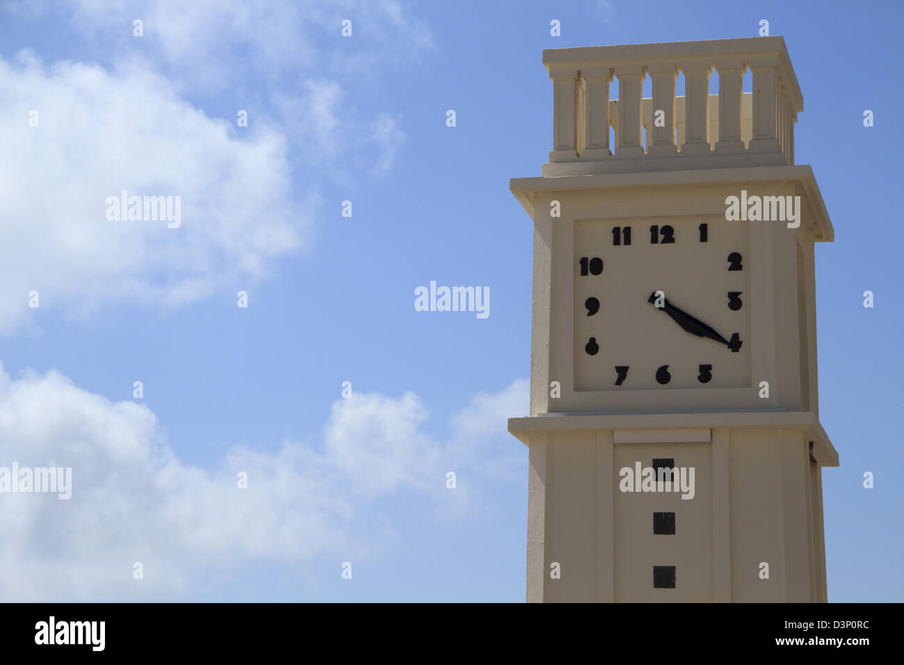 Clock tower under blue sky Stock Photo - Alamy