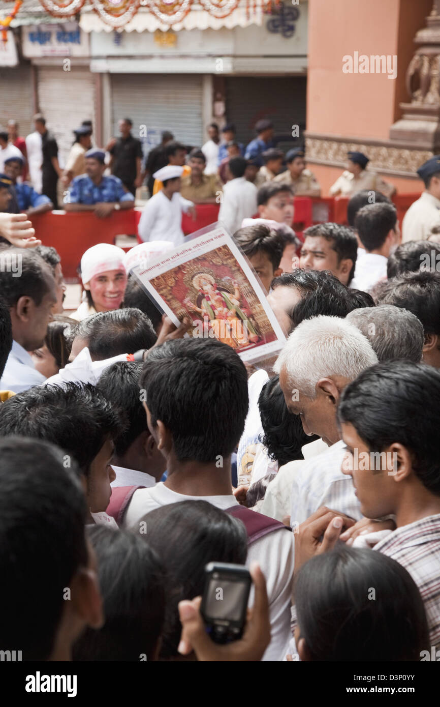 Standing traditional culture religion holding crowd hi-res stock ...