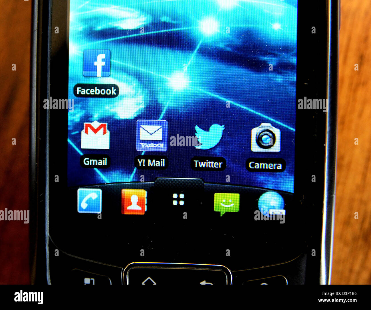 LG Mobile phone with Twitter Facebook GMail and Yahoo Mail apps on ...
