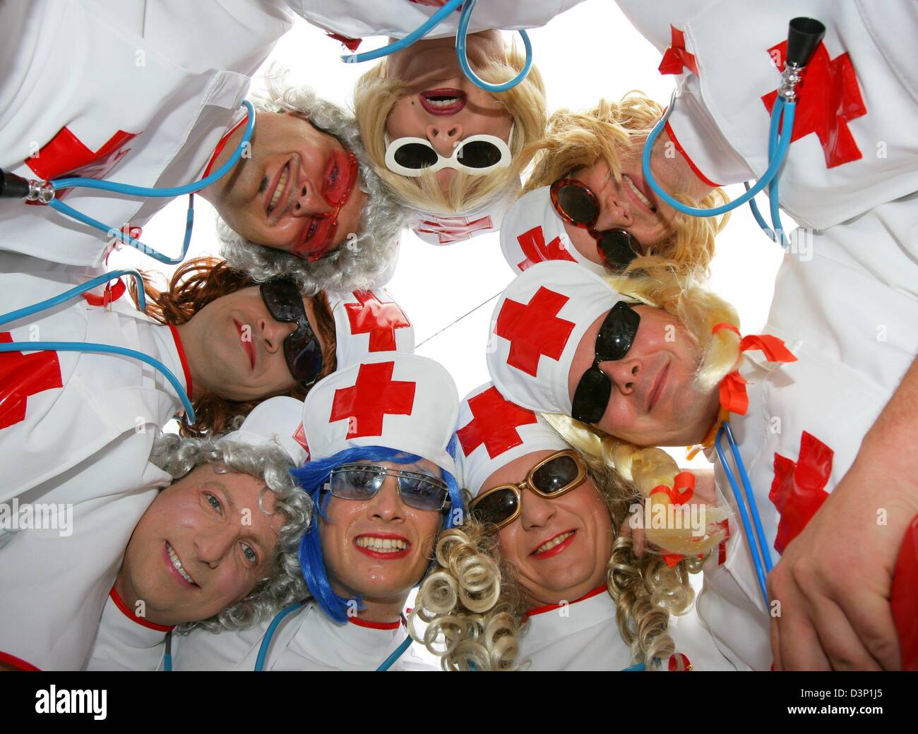 Participants of the Christopher Street Day (CSD) Parade pose in ...