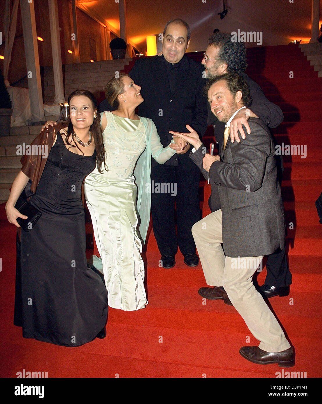 Singers Genia Kuehmeier and Diana Damrau (L-R), conductor Pierre Audi ...