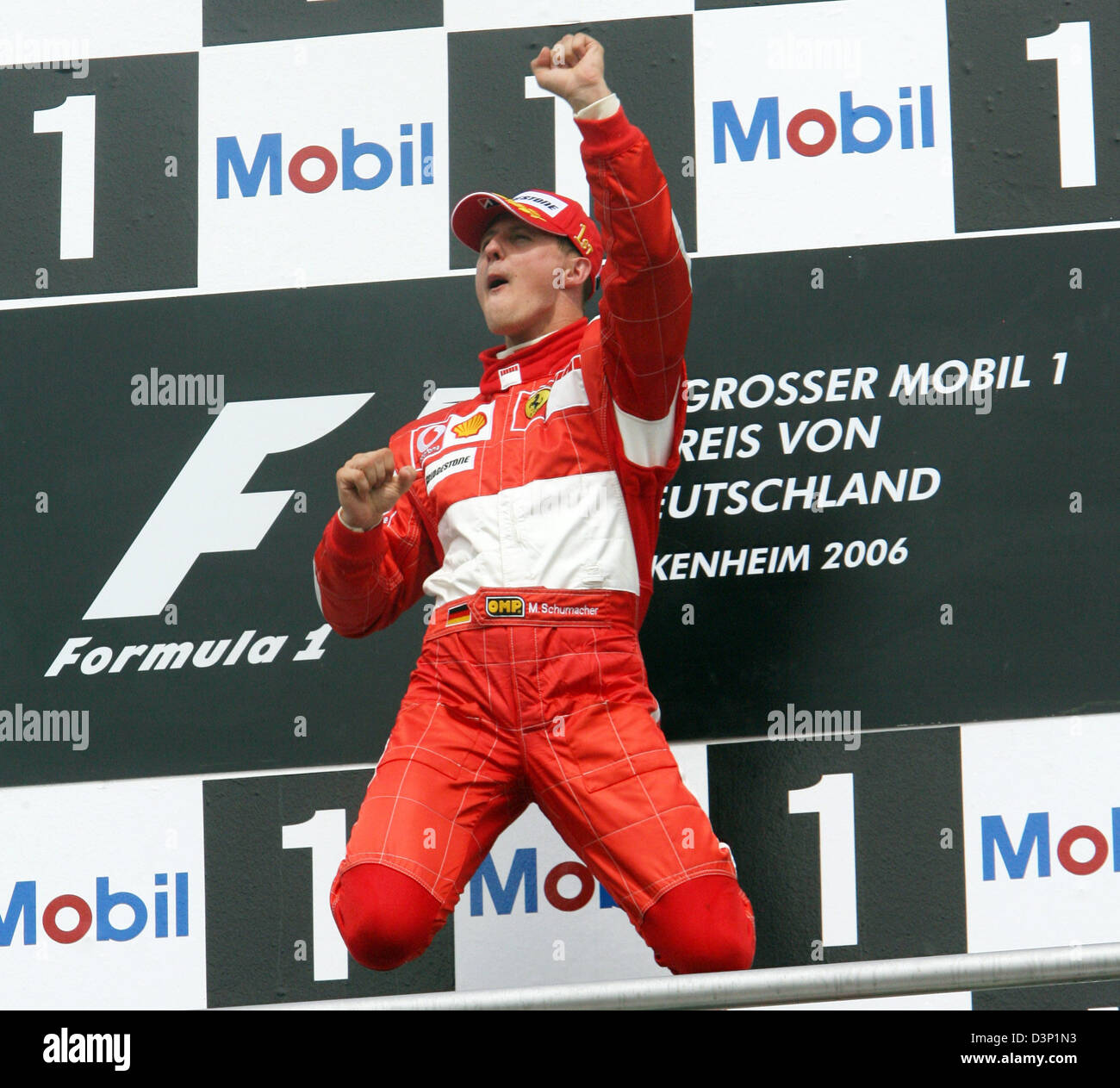 German Formula One driver Michael Schumacher celebrates after his ...