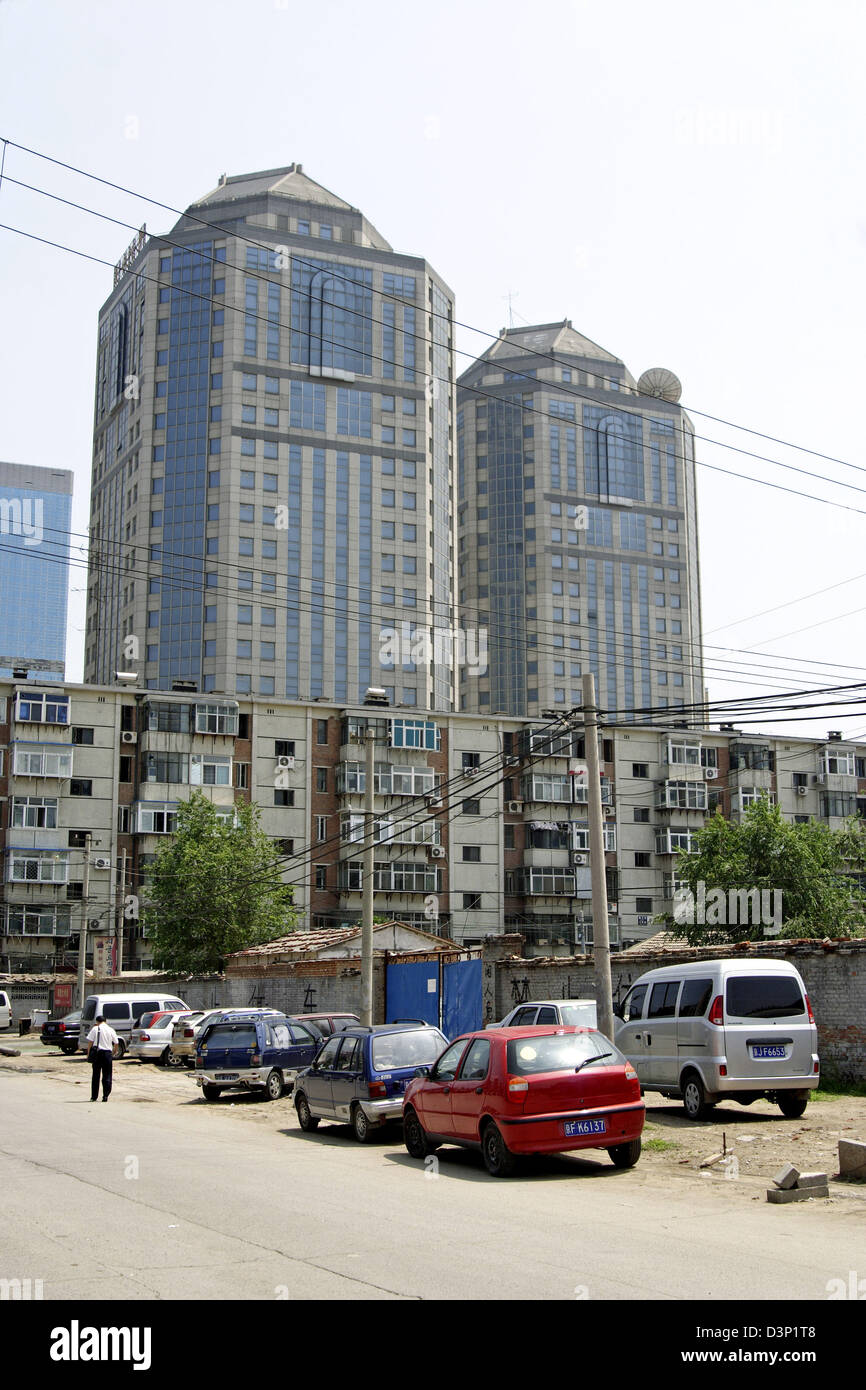 The picture shows a typical view of old and new buildings in Beijing ...