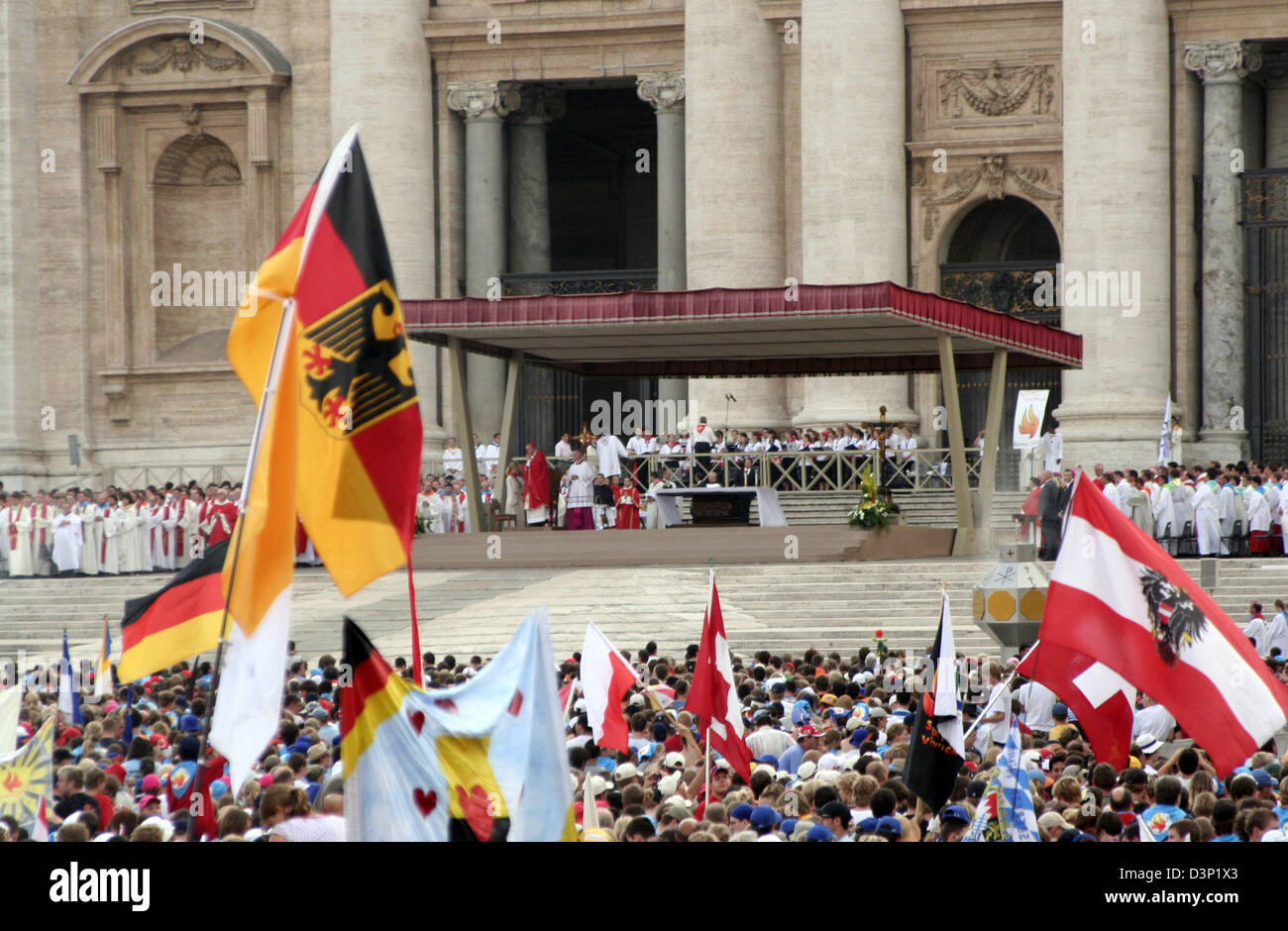 Pilgrims bearing the national flags of Germany, Austria, Switzerland ...