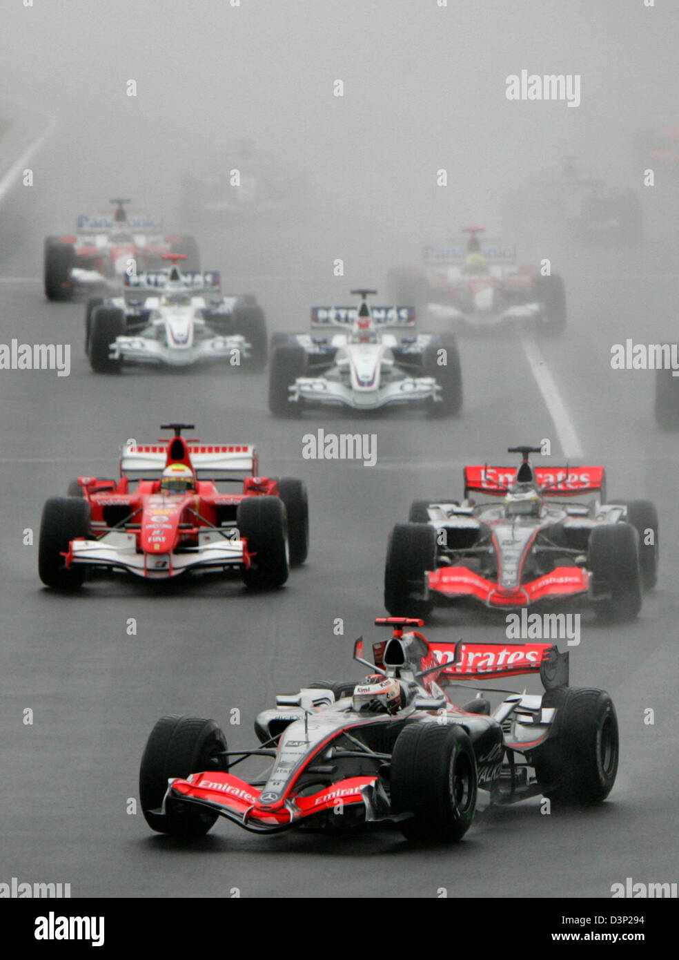 Finnish Formula One driver Kimi Raikkonen of McLaren Mercedes F1 leads ...