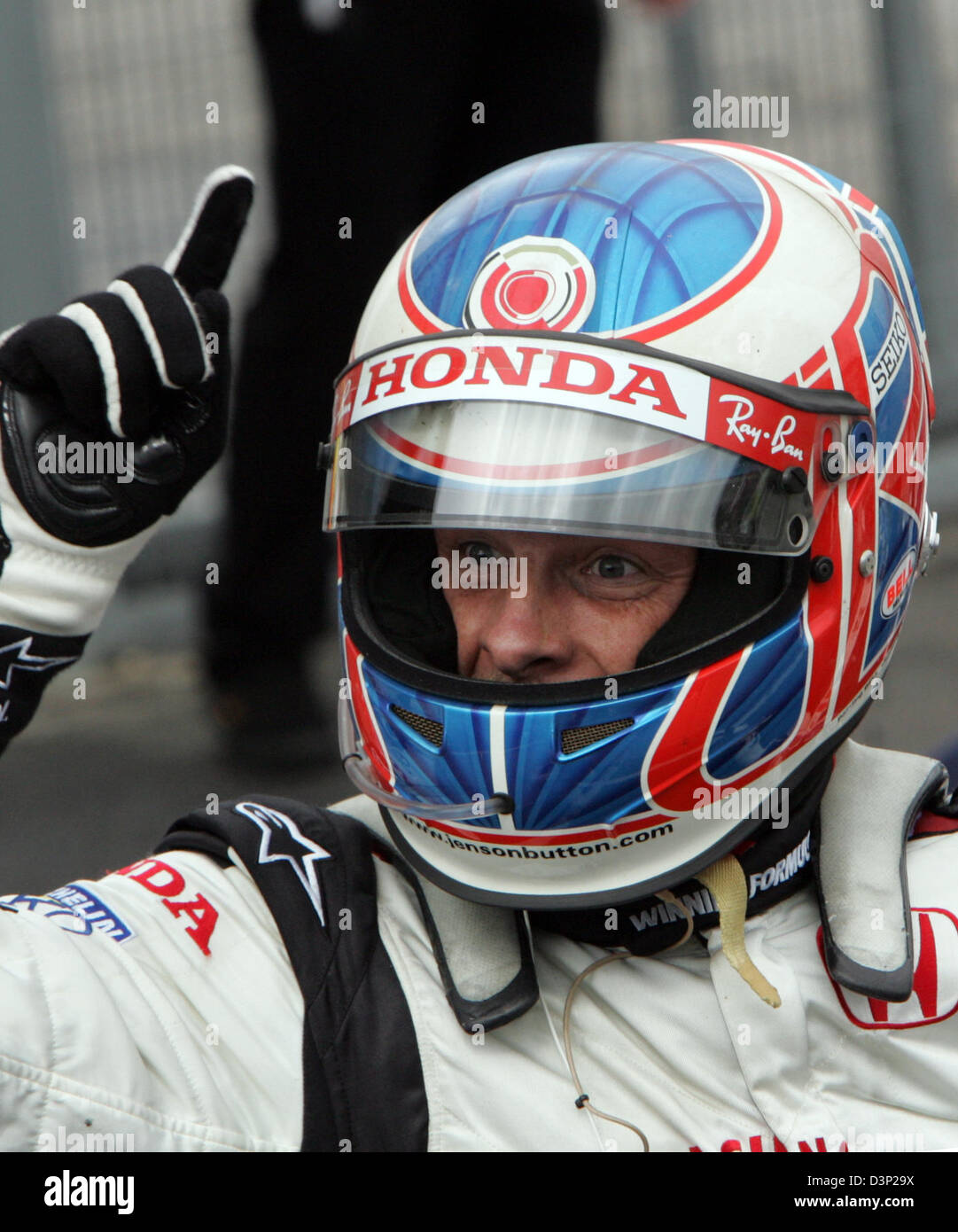 British Formula One driver Jenson Button of Honda F1 Team cheers after ...