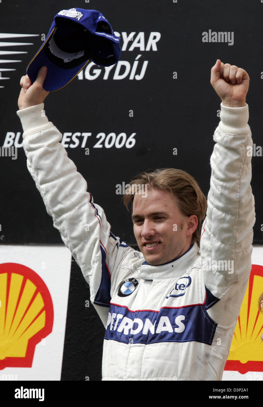 Third-placed German Formula One driver Nick Heidfeld of BMW-Sauber F1 ...