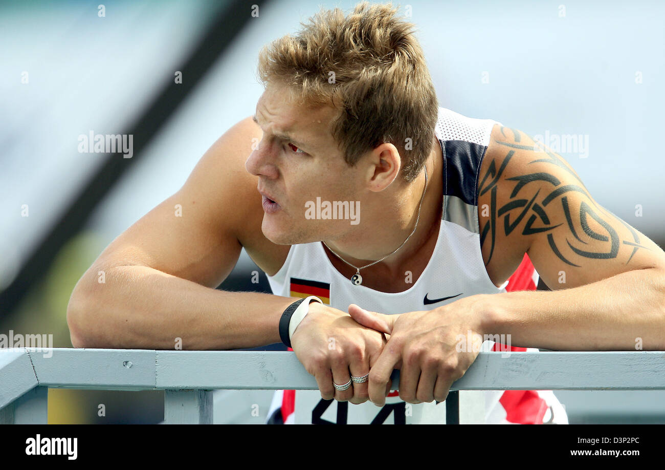 German athlete Thomas Blaschek looks to the display board after the ...