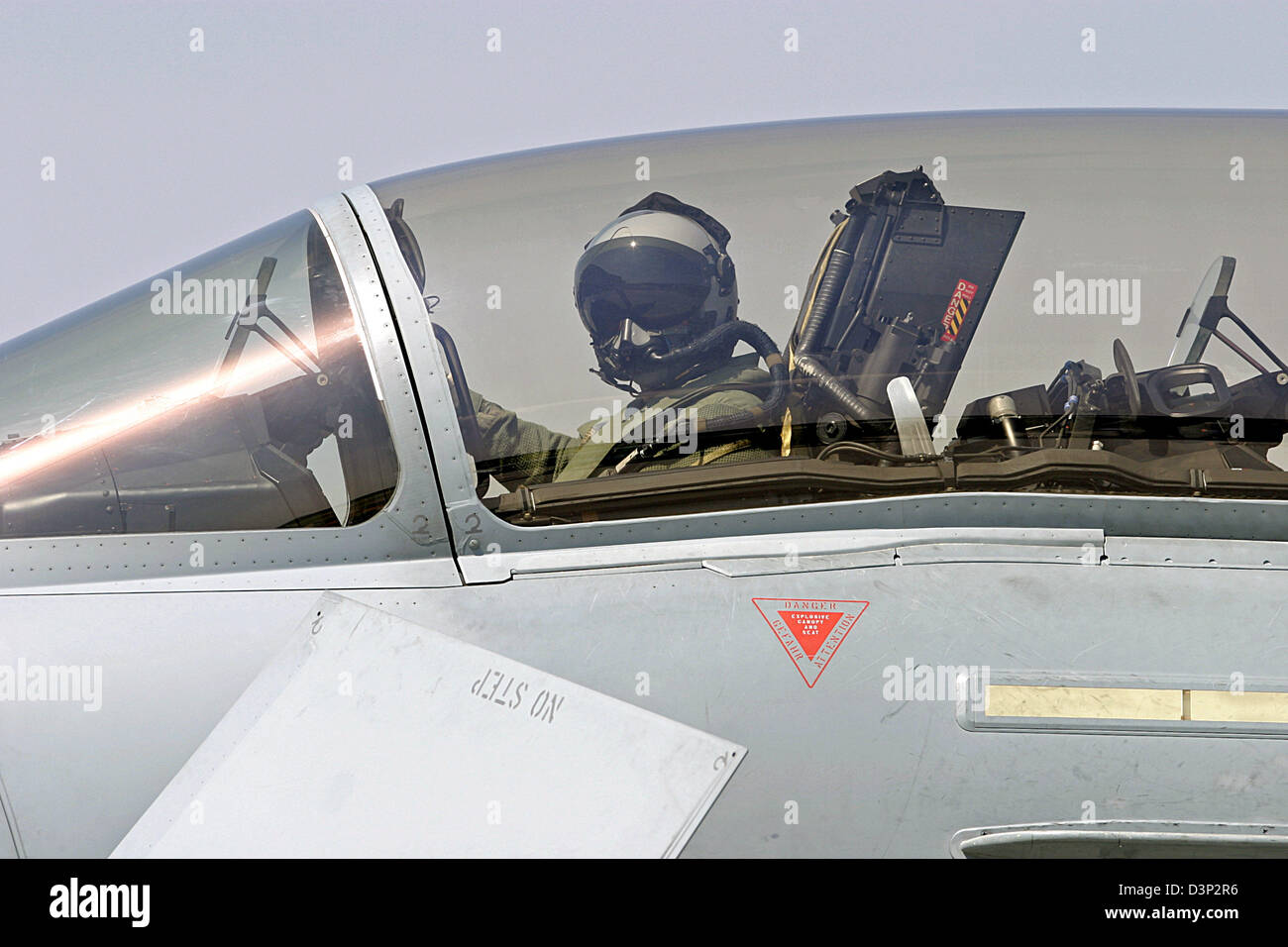 A pilot of a Eurofighter pursuit jet pictured in the cockpit on the ...