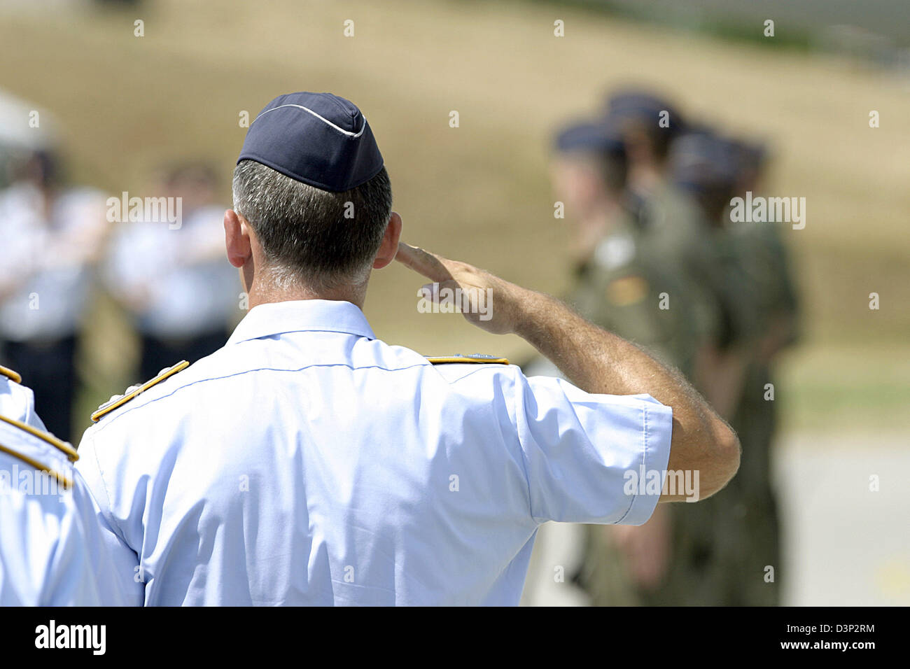 A captain of the German Air Force salutes at the ceremonial handover of ...