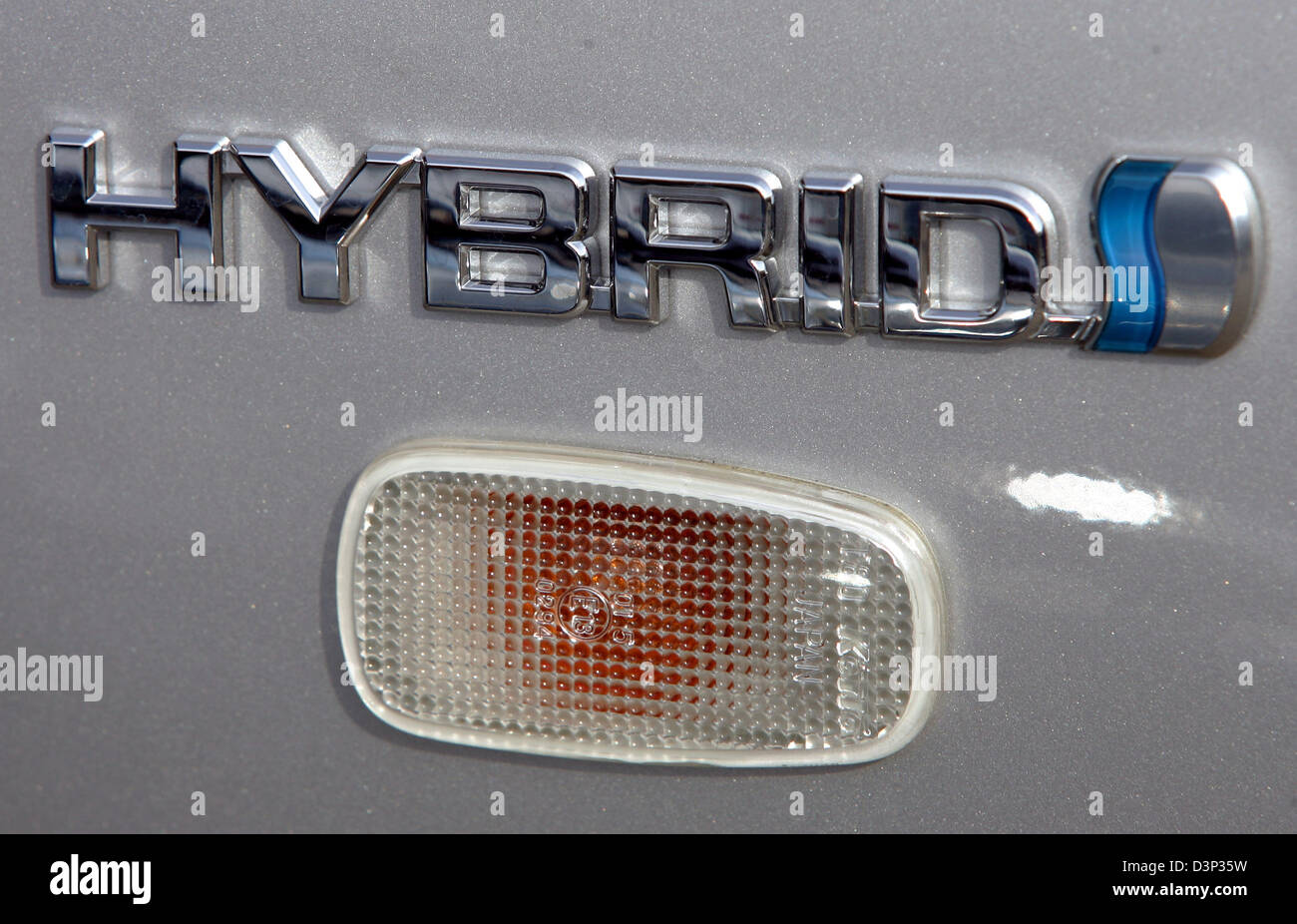 The picture shows the sign 'Hybrid' on a Toyota Prius, a hybrid car, in ...