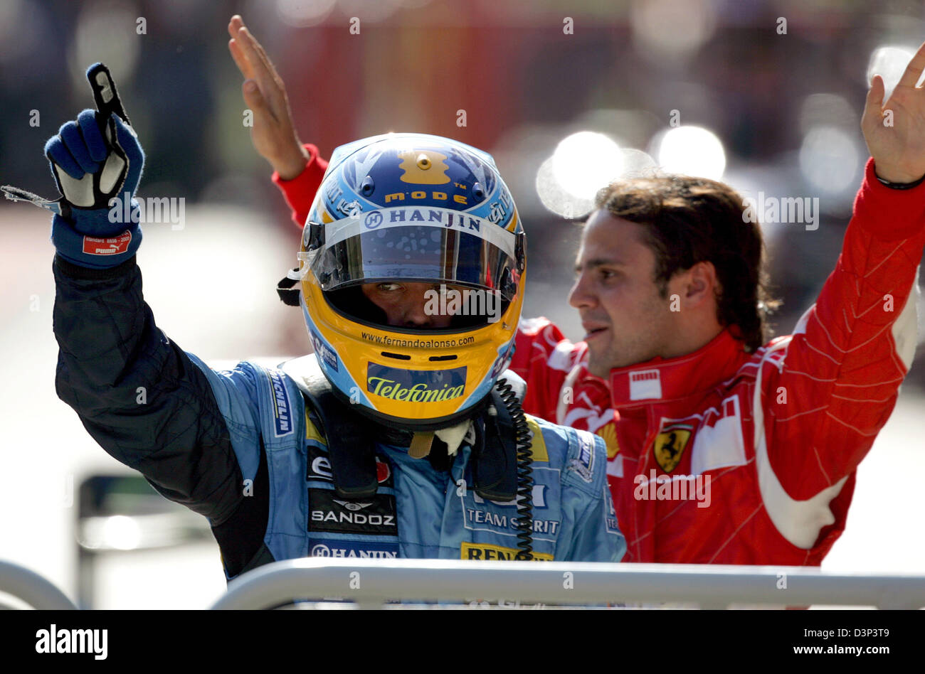 Spanish Fernando Alonso of Renault F1 team celebrates his second place ...